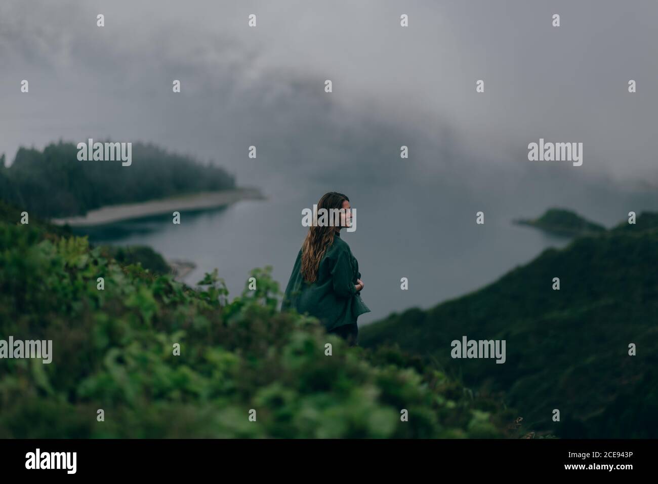 Woman on high hill hi-res stock photography and images - Alamy