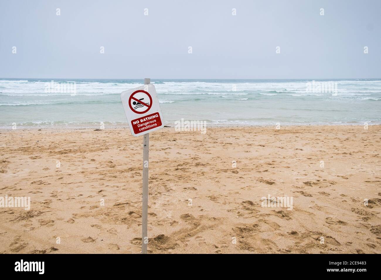A metal No Bathing sign on Fistral Beach in Newquay in Cornwall Stock ...