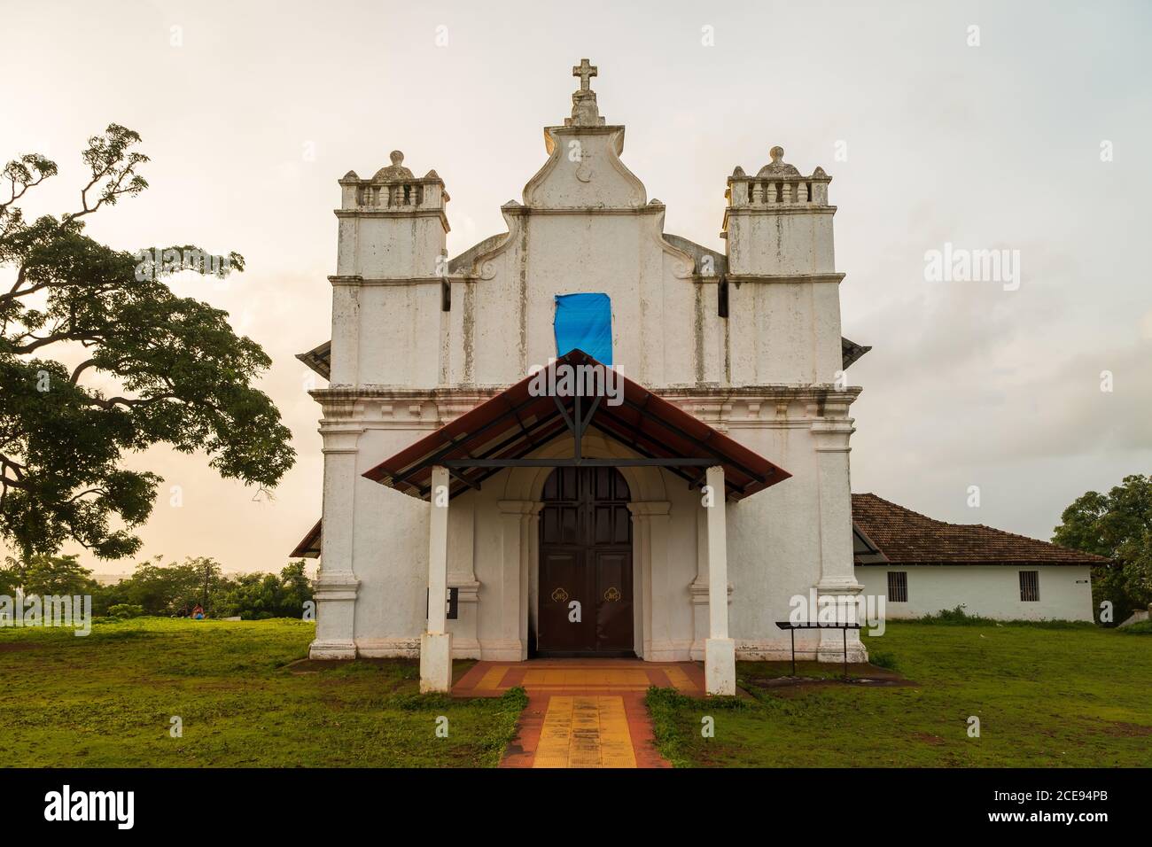 A simple entrance to the three Kings chapel with Portuguese ...