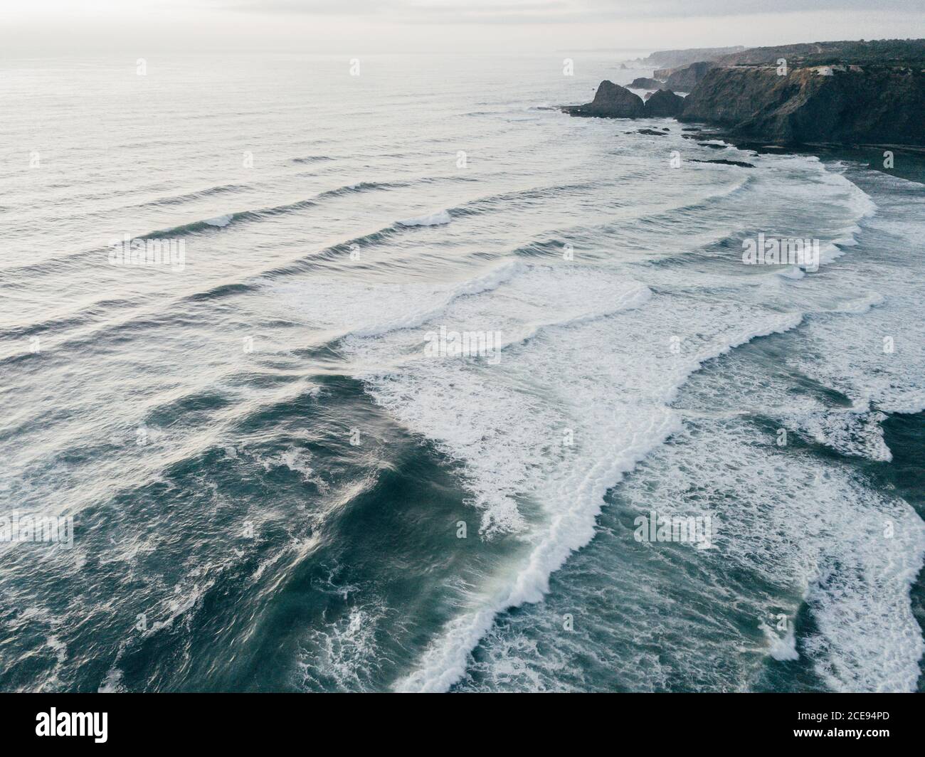 View of ocean waves on beach Stock Photo - Alamy