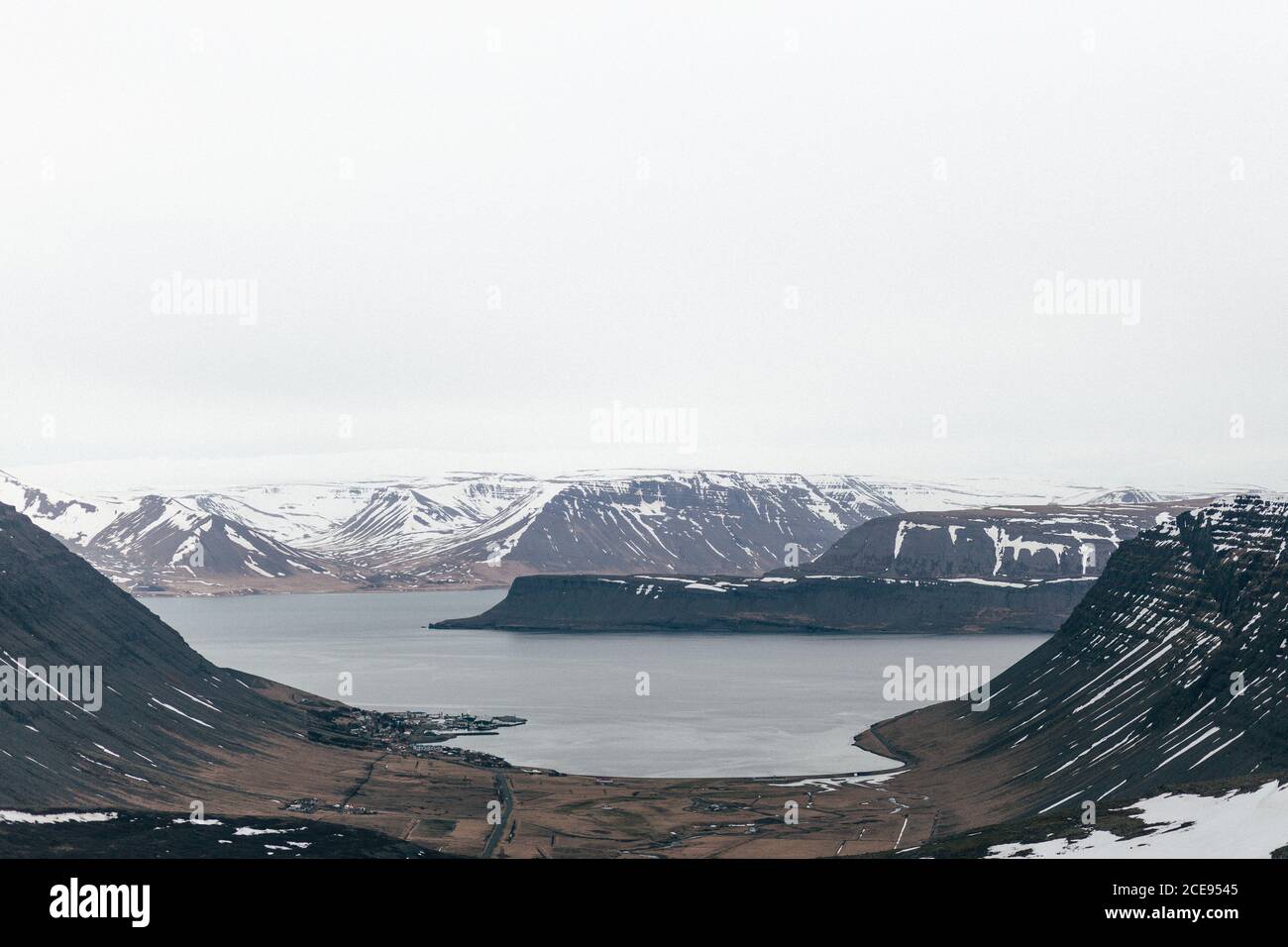 Aerial view of amazing land with snowy spacious terrain and mountains ...