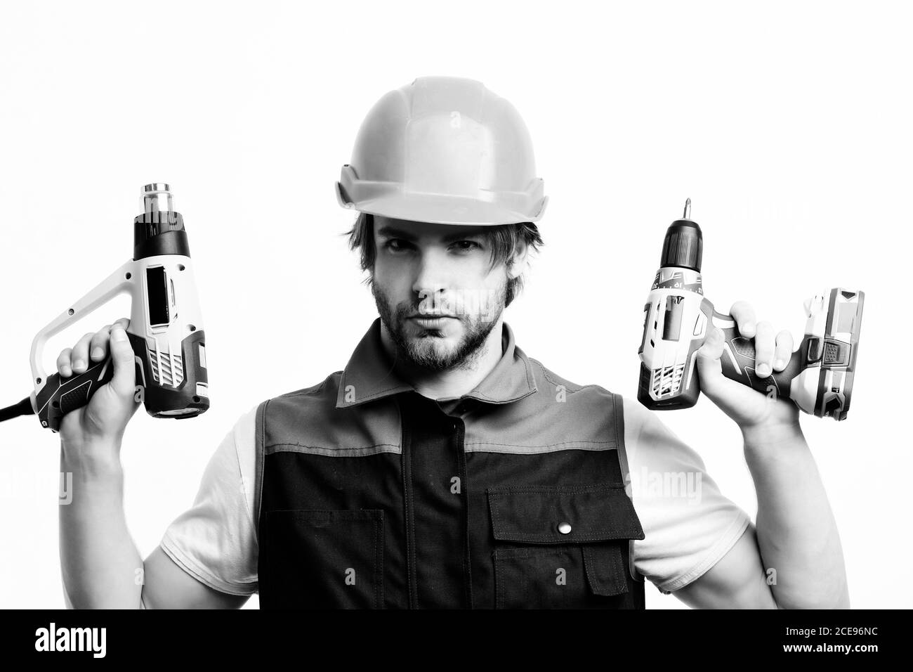 Work in progress and building concept. Builder in orange helmet and ...