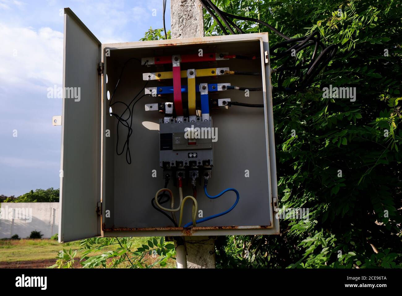 a close shot of opened electrical metre box isolated on pole Stock ...