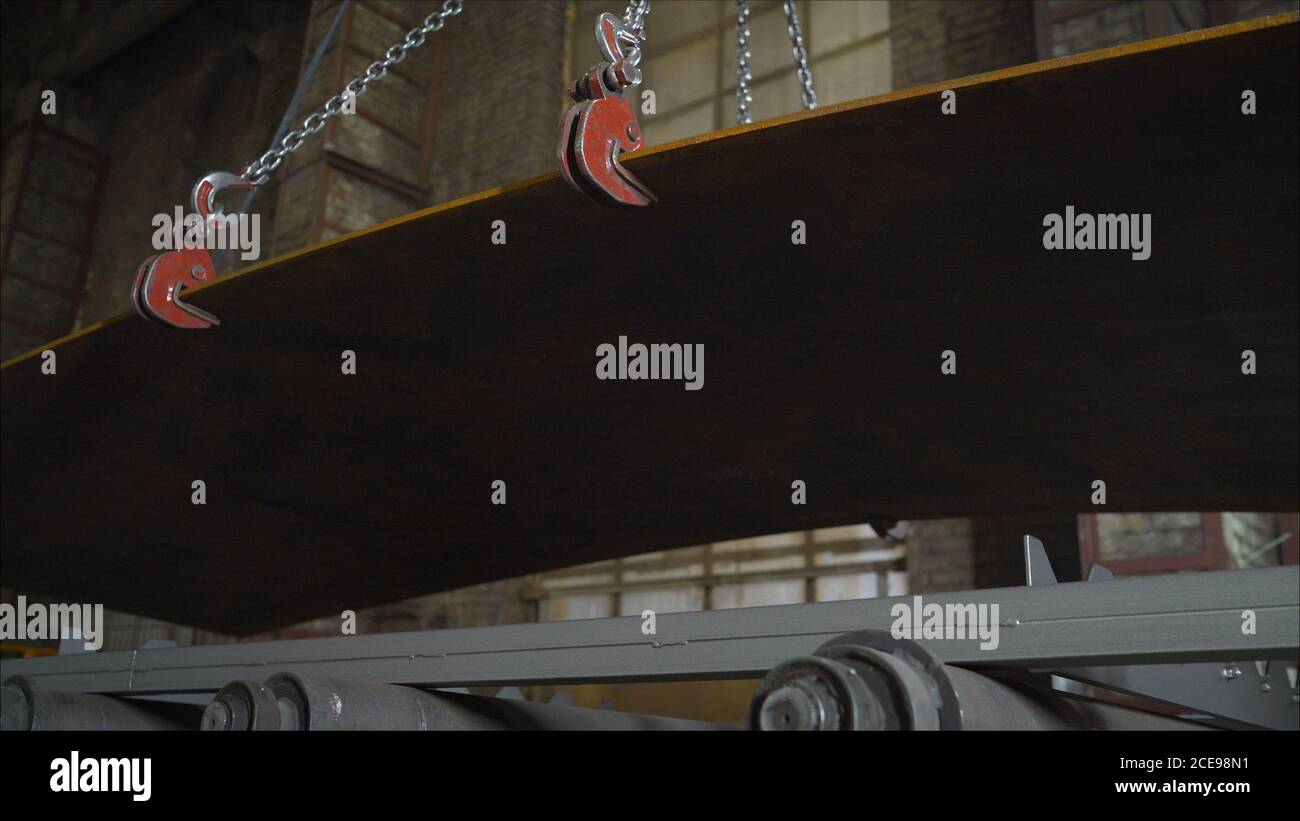 Crane chain and hook with black background. Factory crane hook at an ...