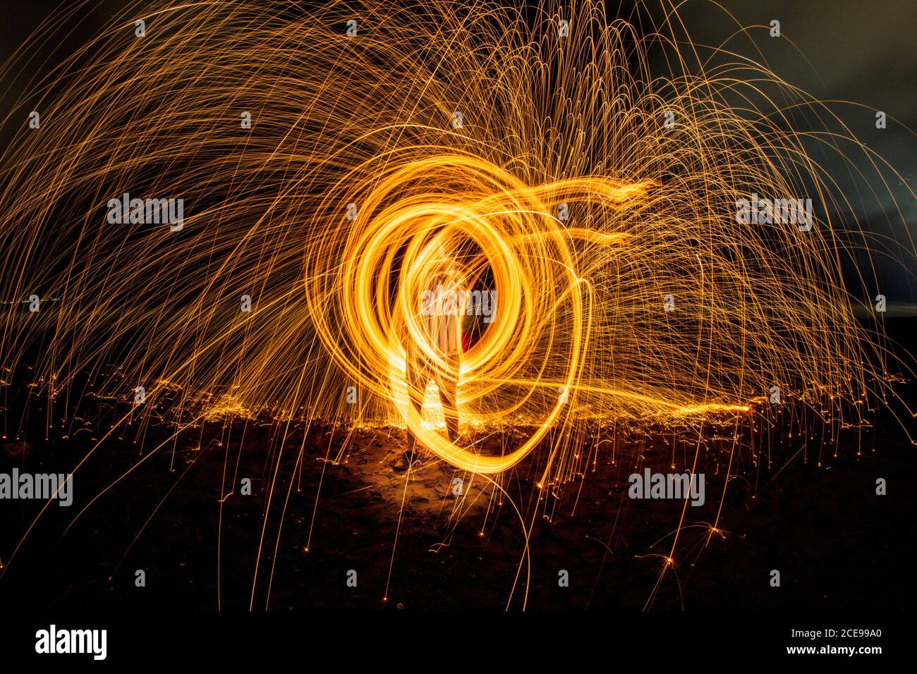 Amazing steel wool fire circles at night with glowing sparks Stock ...