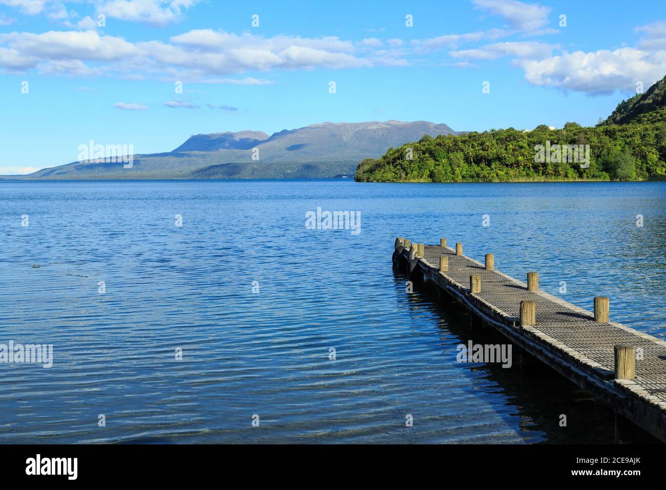 Beautiful Lake Tarawera, New Zealand, seen from Kotukutuku Bay. A pier ...