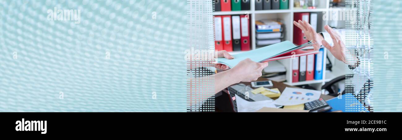 Overworked businessman refusing work; panoramic banner Stock Photo - Alamy