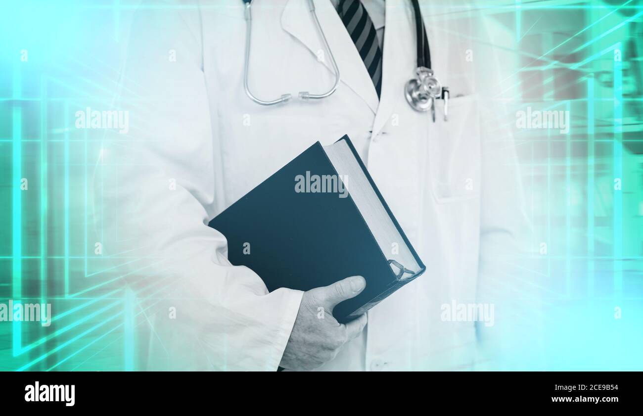 Doctor standing and holding a medical textbook; multiple exposure Stock ...