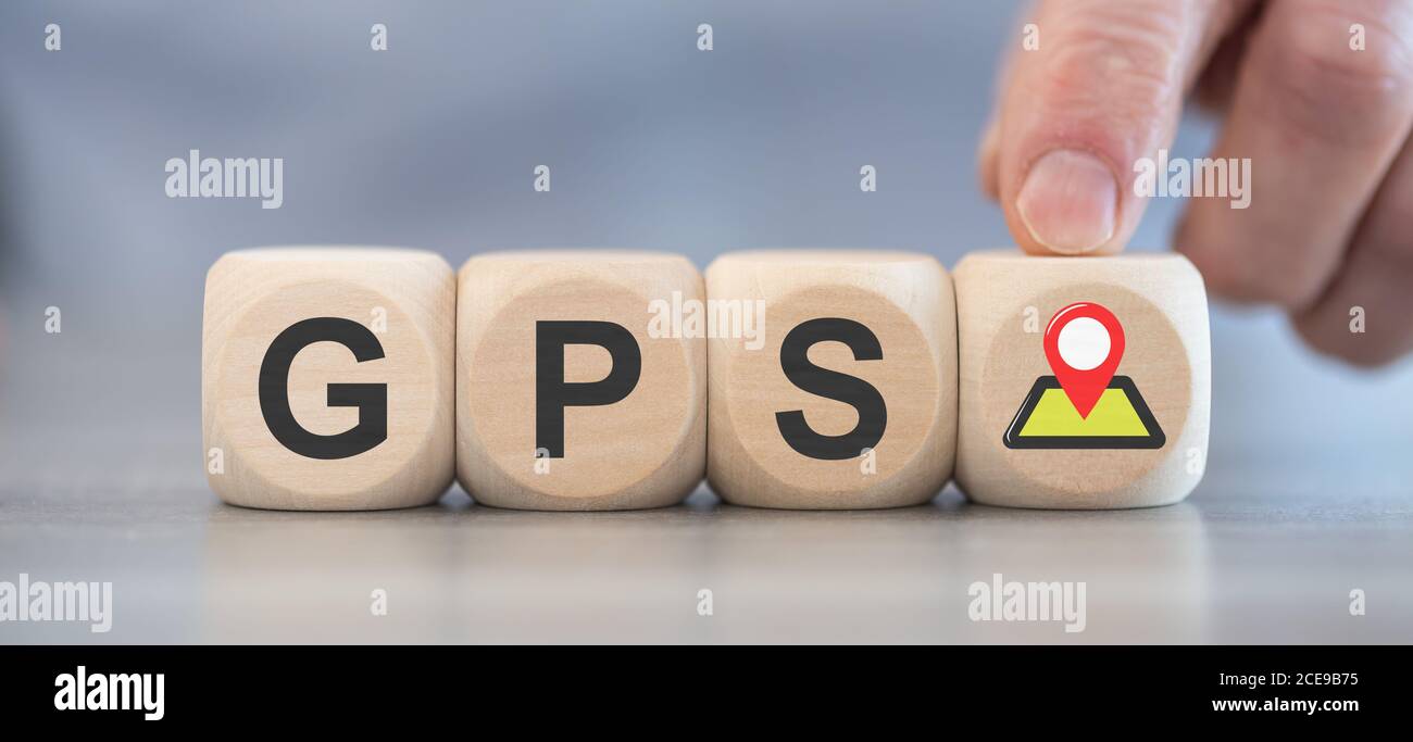 Concept of GPS on wooden blocks Stock Photo - Alamy