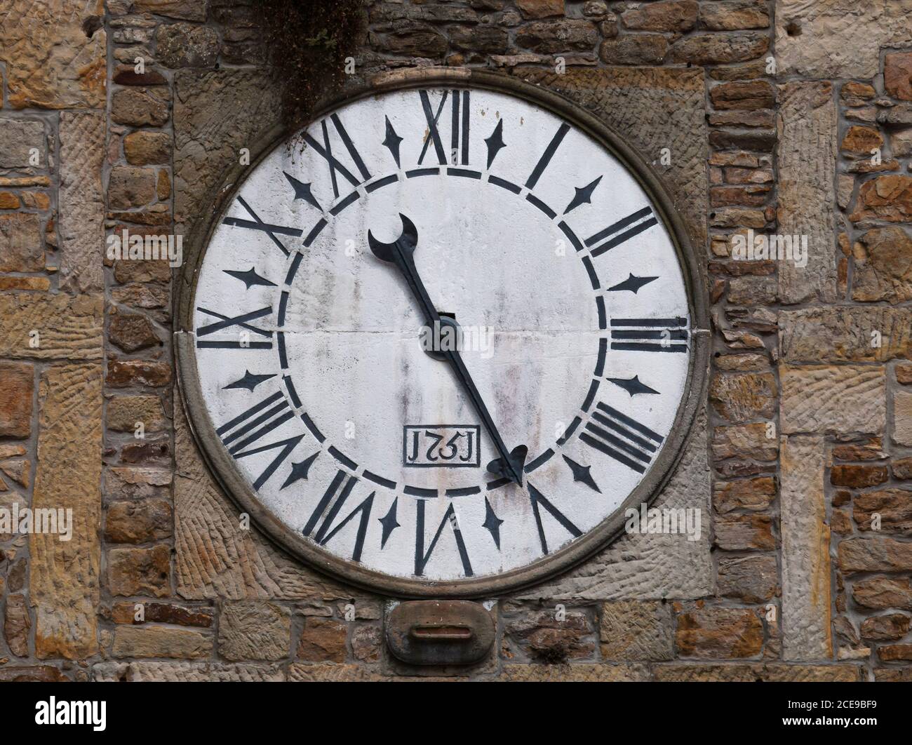 Old clock on the facade of an abandoned and ruined church Stock Photo ...