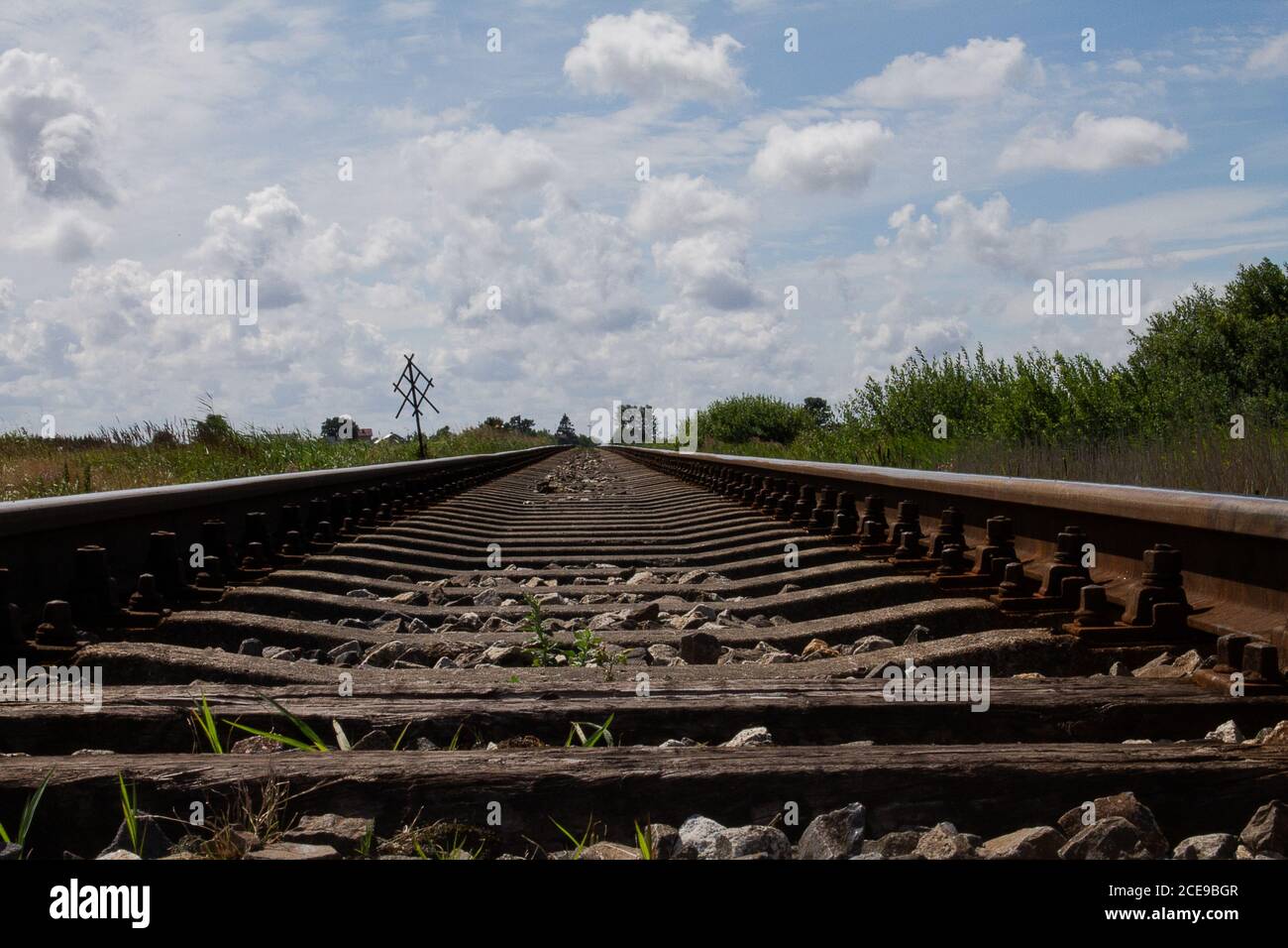 Railroad tracks in the flat country. You can see to the horizon Stock ...