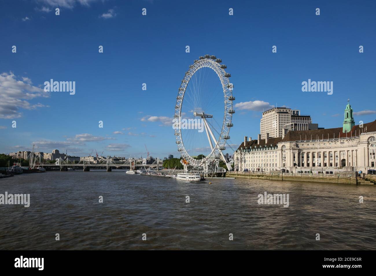 River Thames panoramic view with the London Eye Ferris Wheel and County ...
