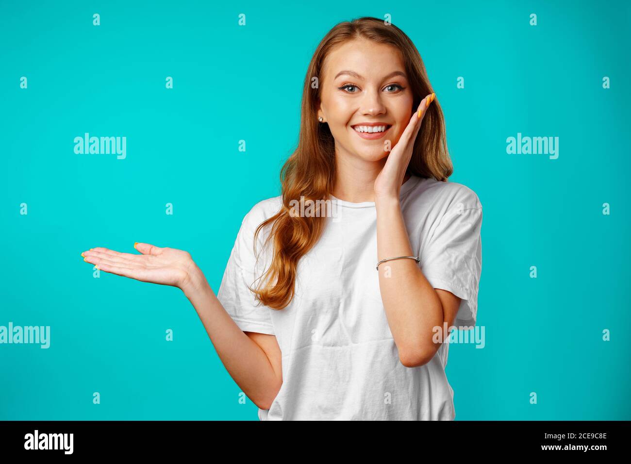 Shocked and amazed young woman with funny face expression Stock Photo ...