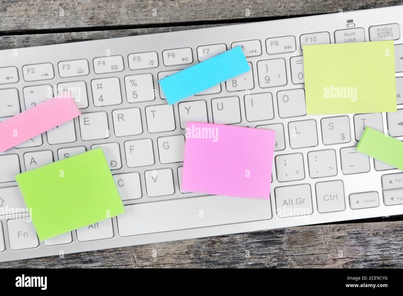 Close-up of many empty colorful notes on computer keyboard Stock Photo ...