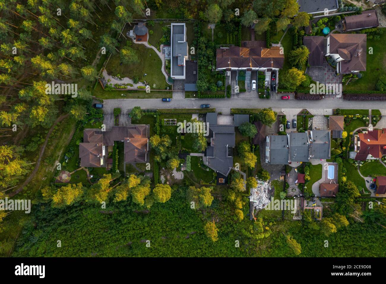 Aerial view of private sector. Cottage village at summer. Roofs of ...
