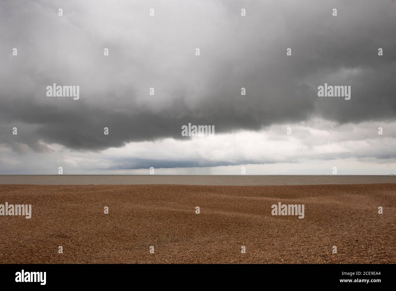 Storm clouds over Shingle Street Beach in Suffolk, UK Stock Photo - Alamy