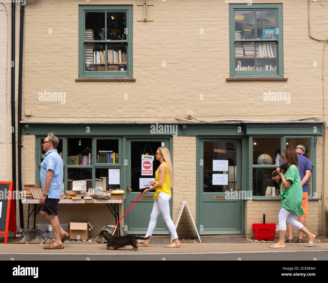 People walking past small shops in Burnham Market, Norfolk, UK Stock ...