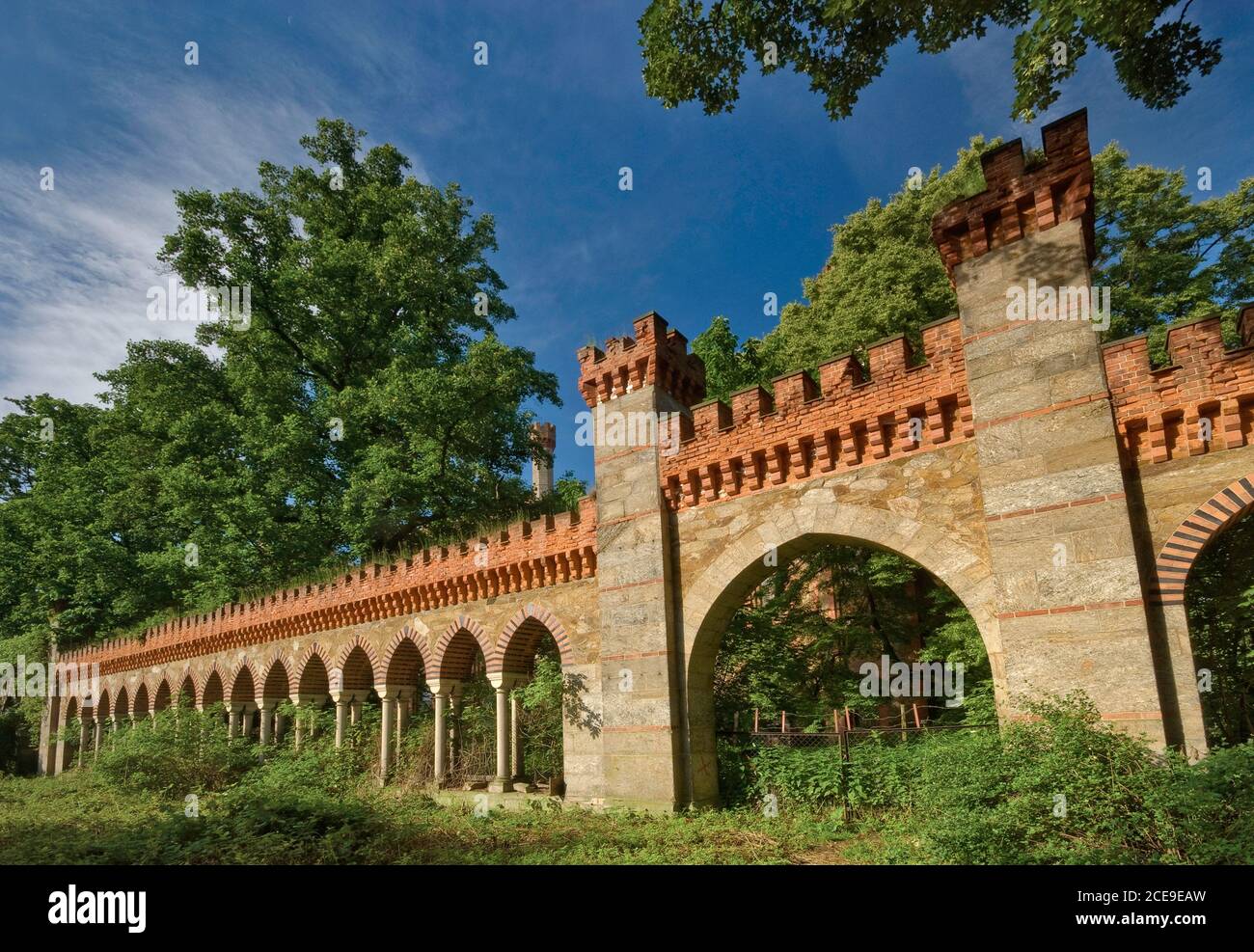 Neogothic gateway, crenellations and arches at Castle at Kamieniec ...
