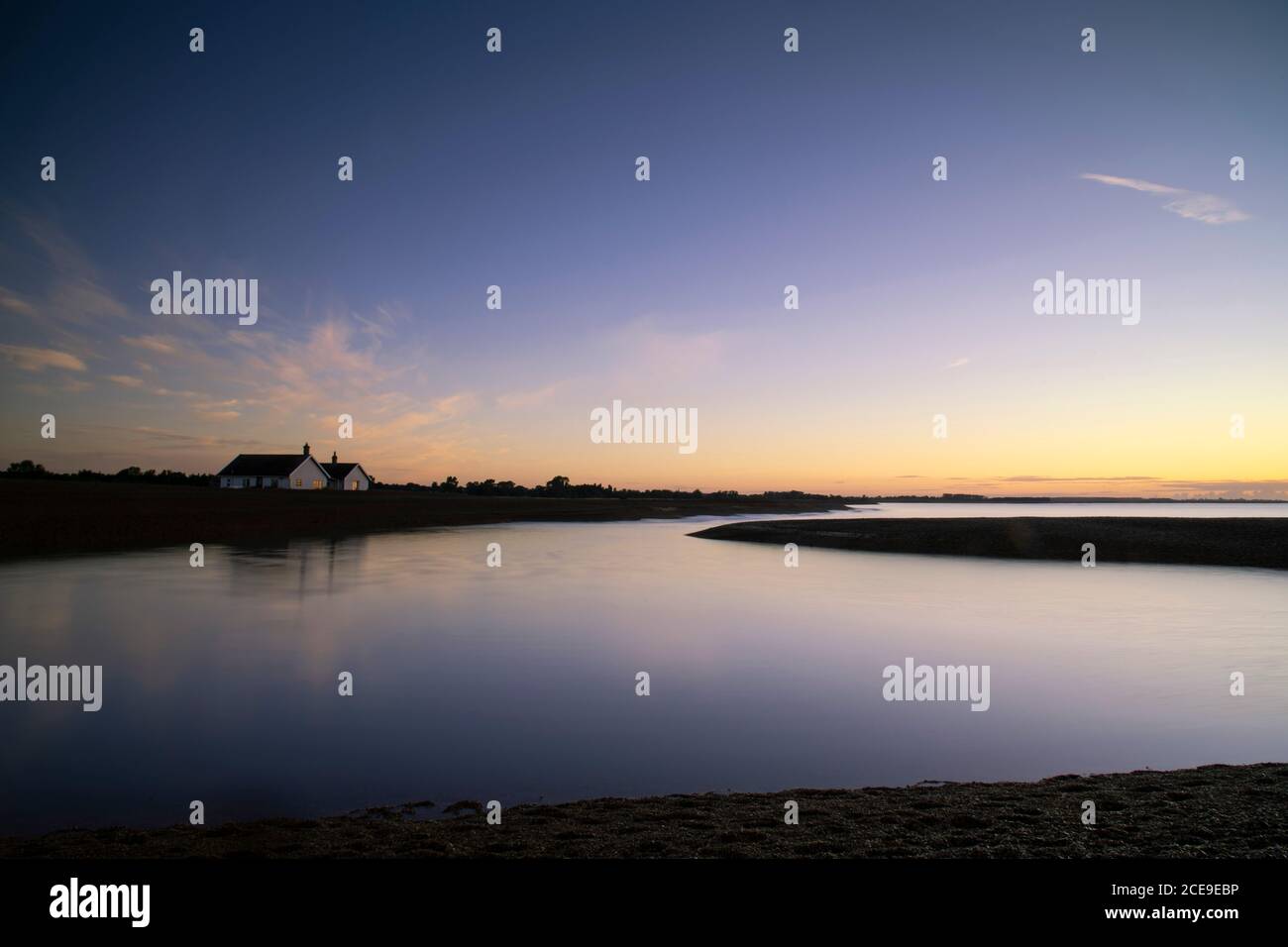 Sun rise at Shingle Street Beach, Suffolk, UK Stock Photo - Alamy