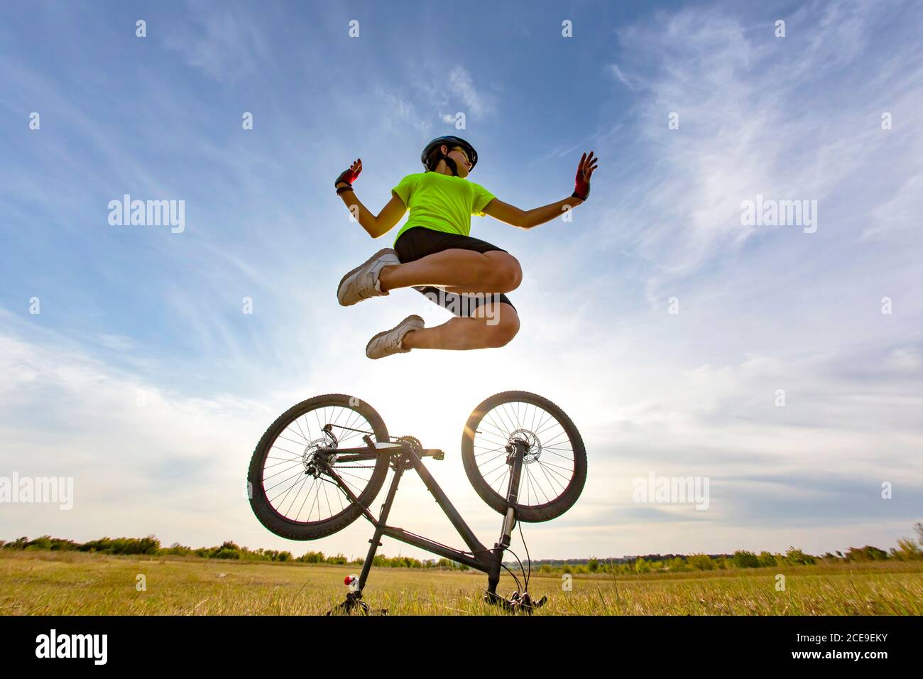 Girl bike jump not boy hi-res stock photography and images - Alamy