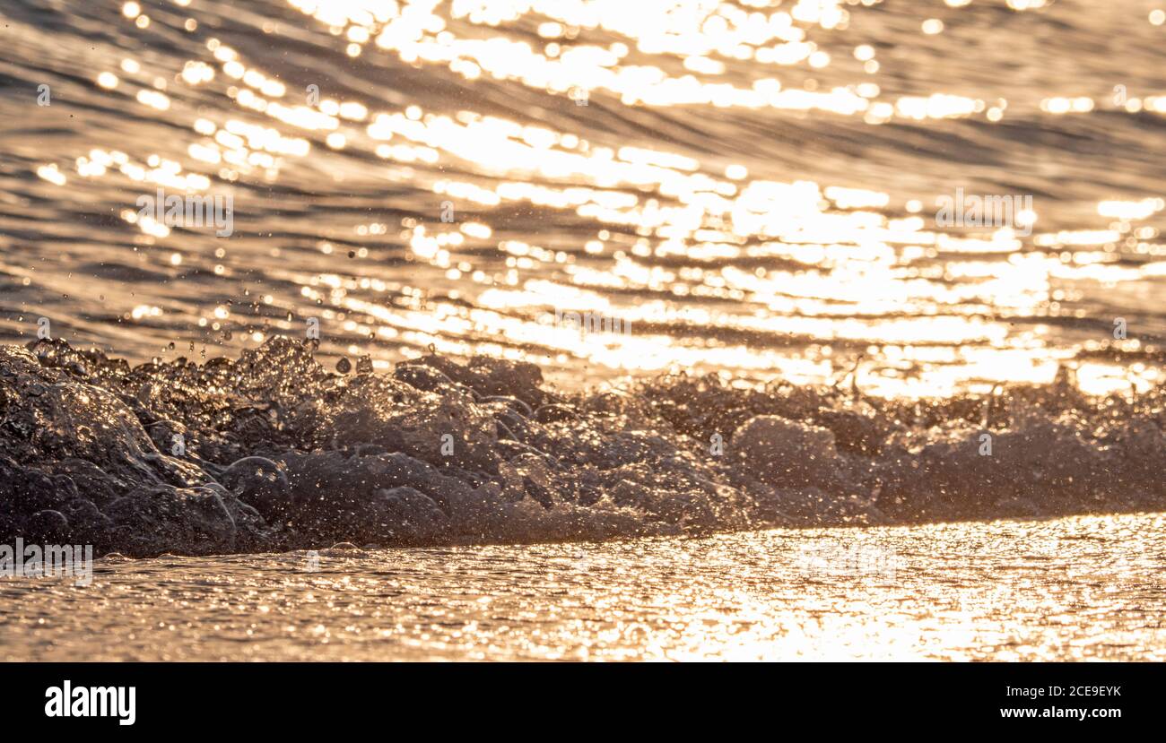 wave splash sea beach macro, close up Stock Photo - Alamy