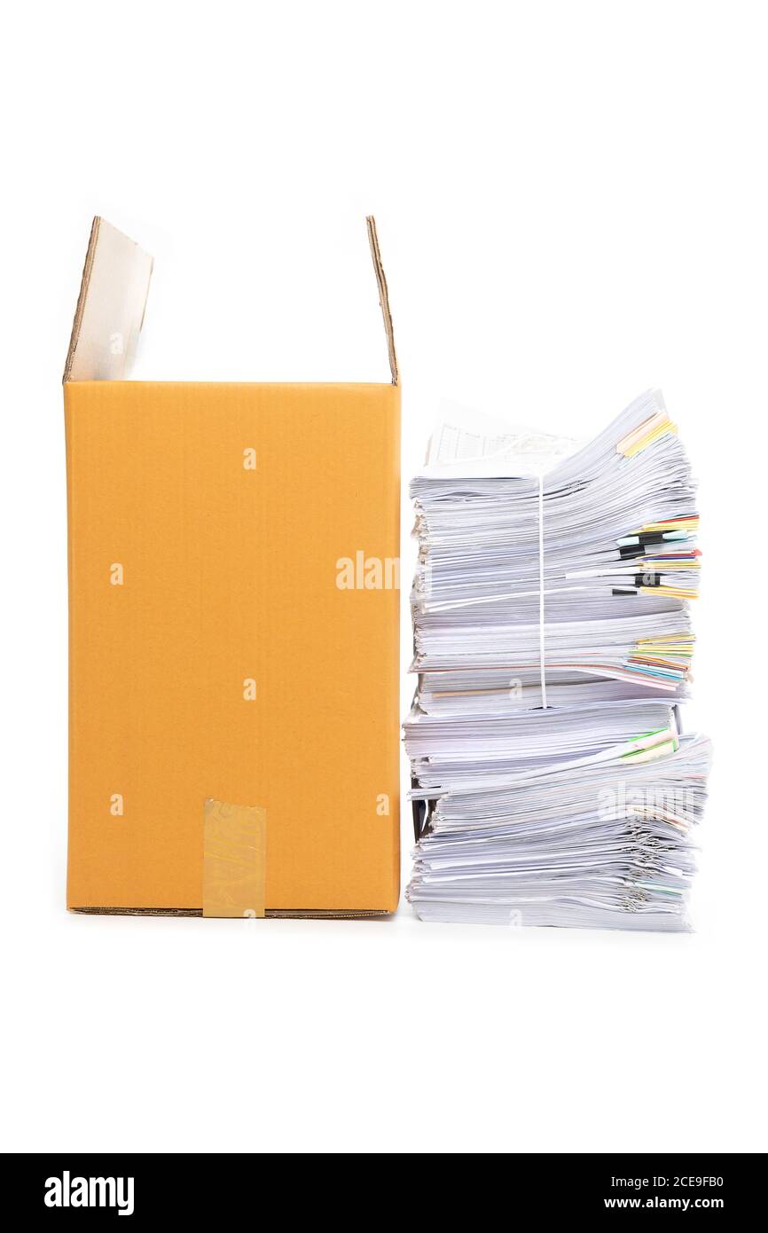 Stack of Documents and corrugated cardboard box isolated on white ...
