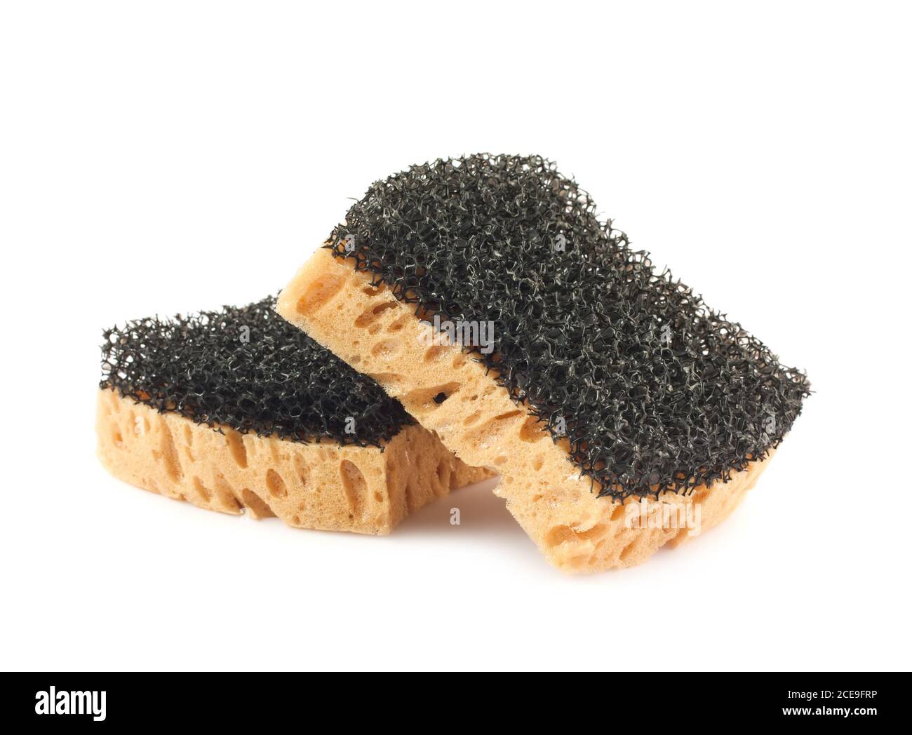 Two sponges on white background Stock Photo - Alamy