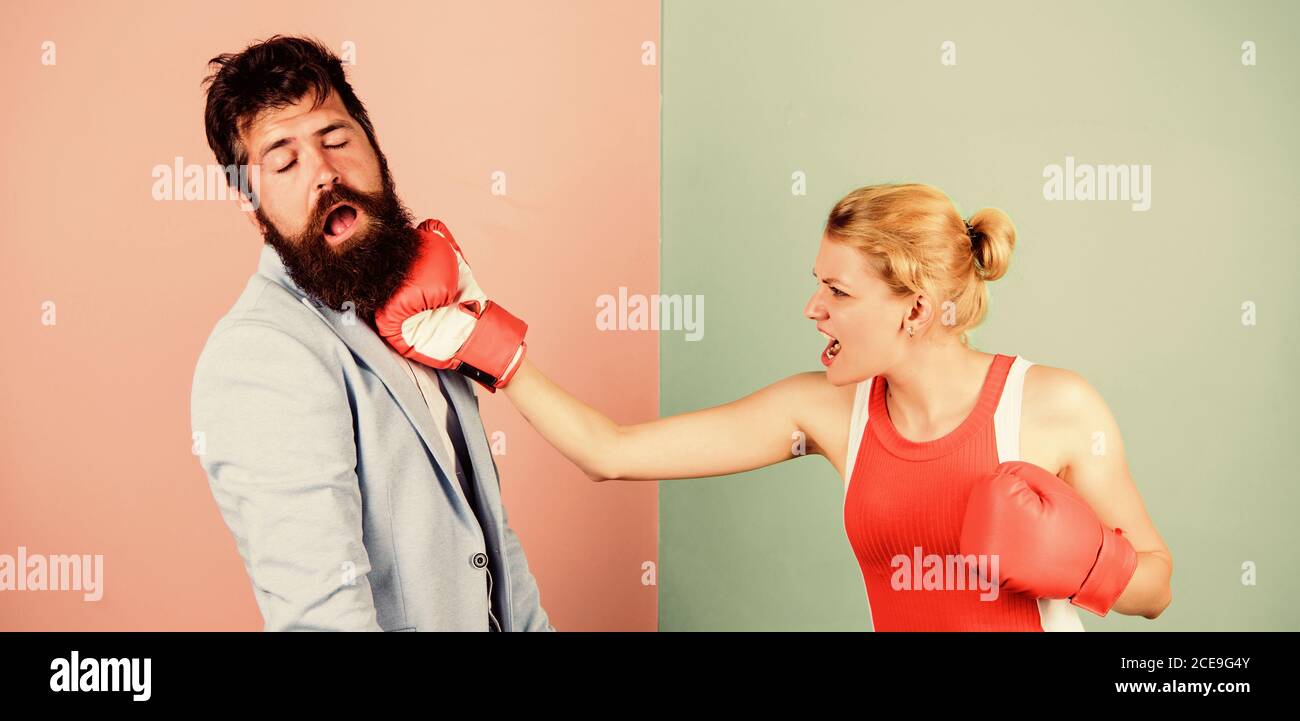 Gender equal rights. Couple in love competing in boxing. Conflict ...