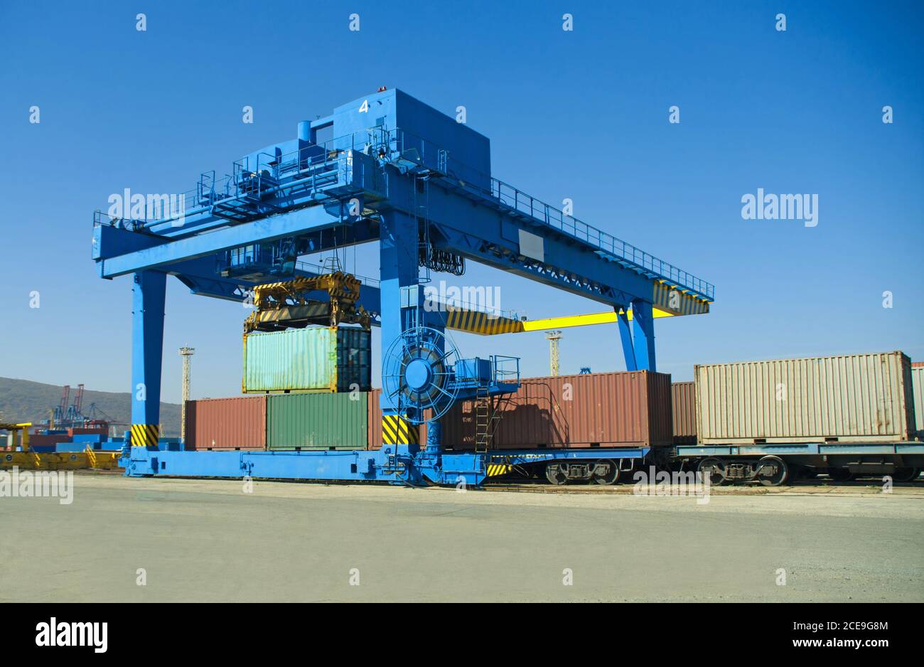 Loading of containers Stock Photo - Alamy
