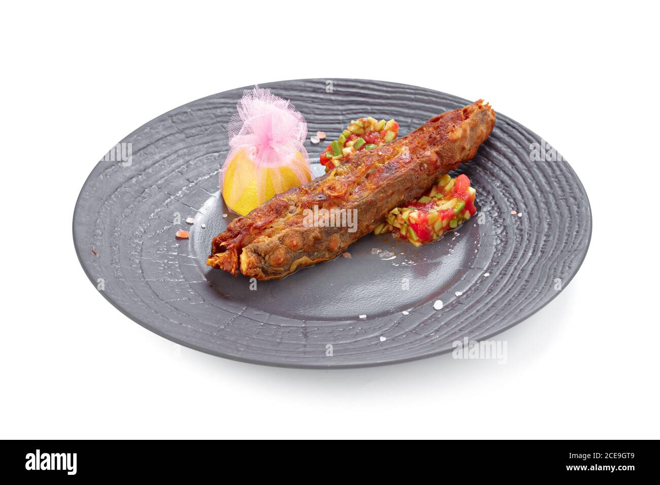Fried fish on plate isolated on white Stock Photo - Alamy