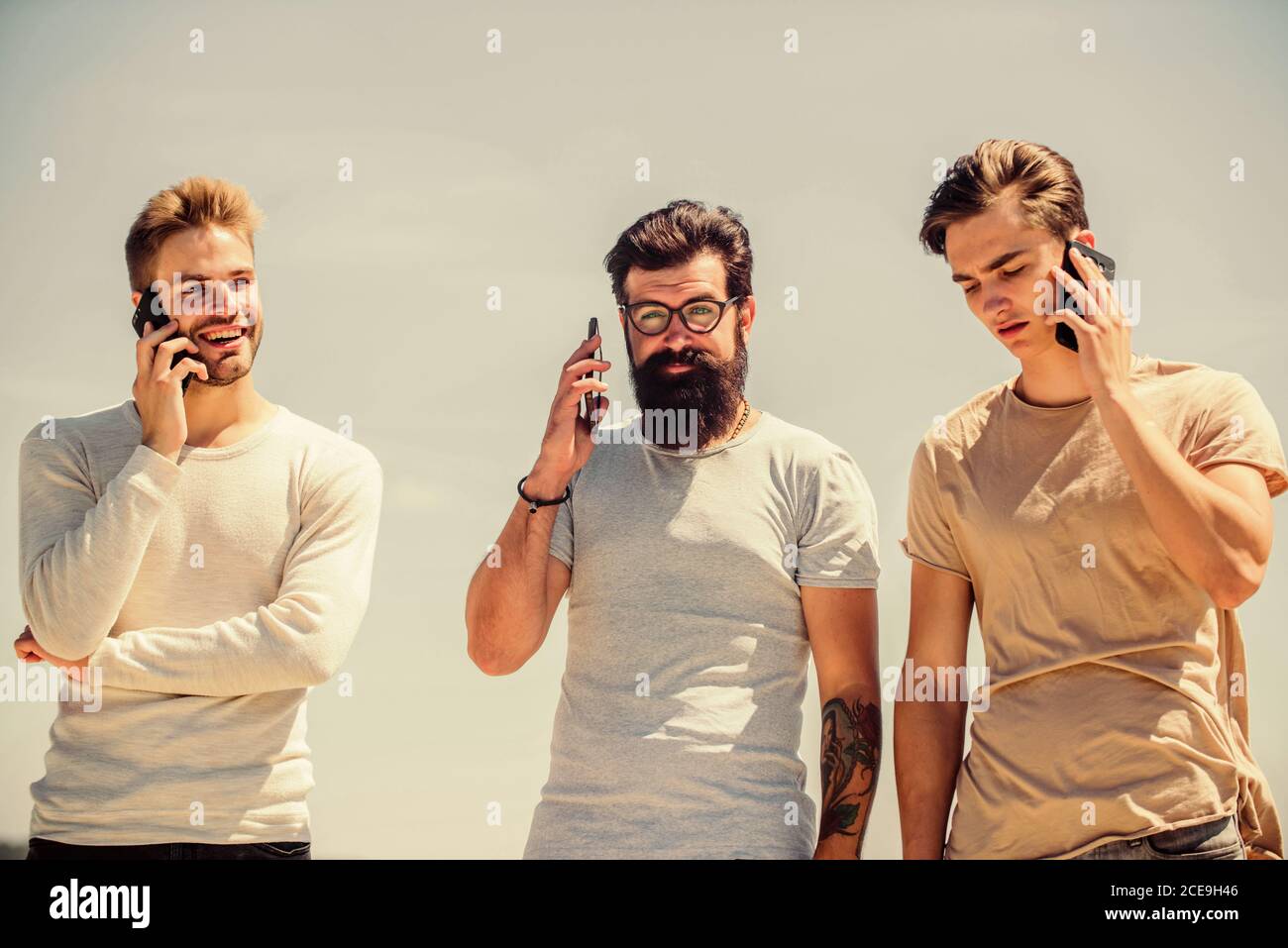 Mobile phone conversation. Friends chatting sky background. Mobile ...