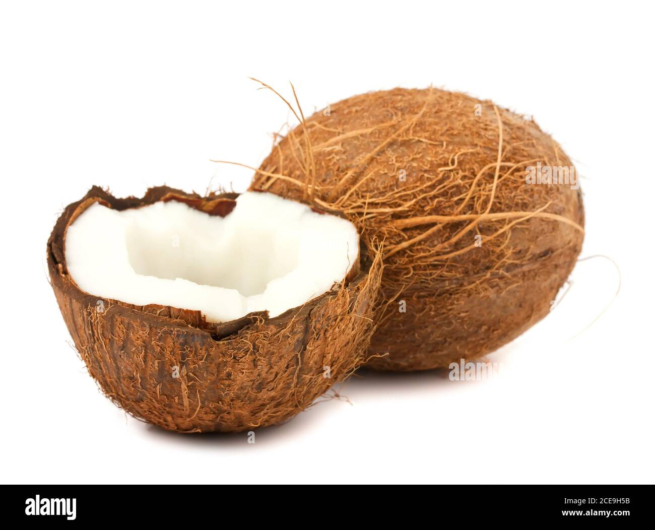 Whole coconut and half Stock Photo - Alamy