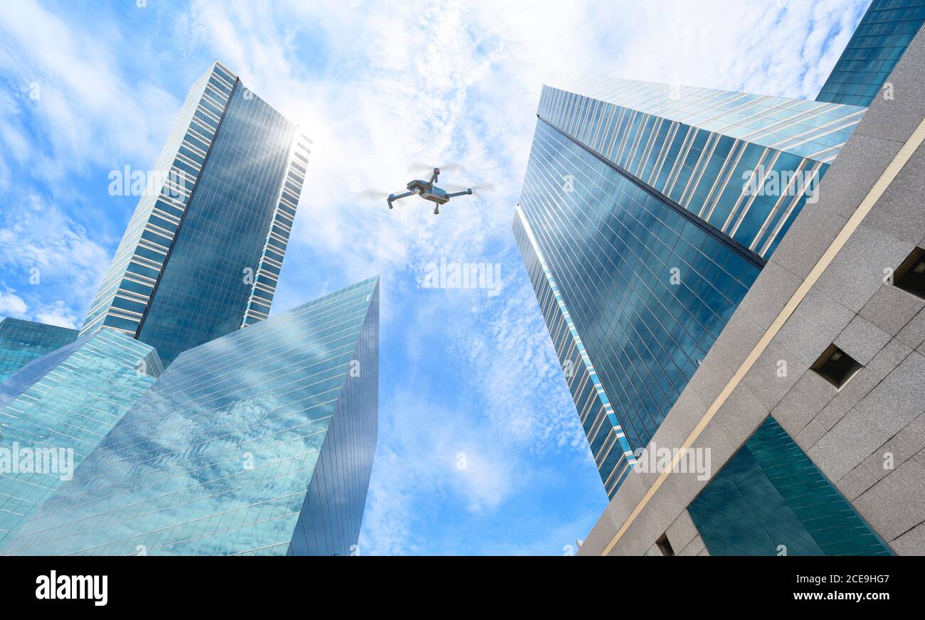 Drone Camera-based flying technology explores over bigcity Stock Photo ...
