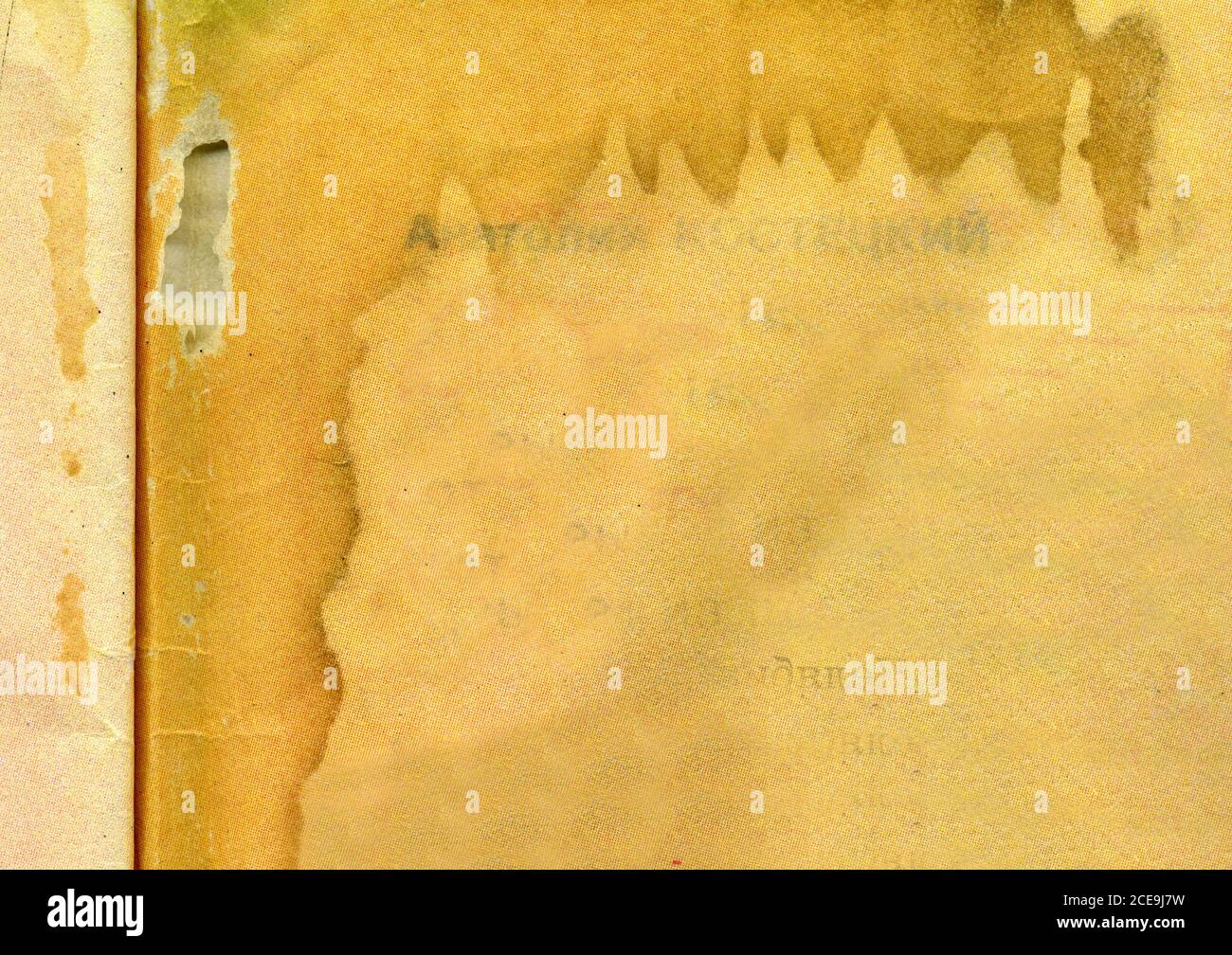 spot on yellow paper Stock Photo - Alamy