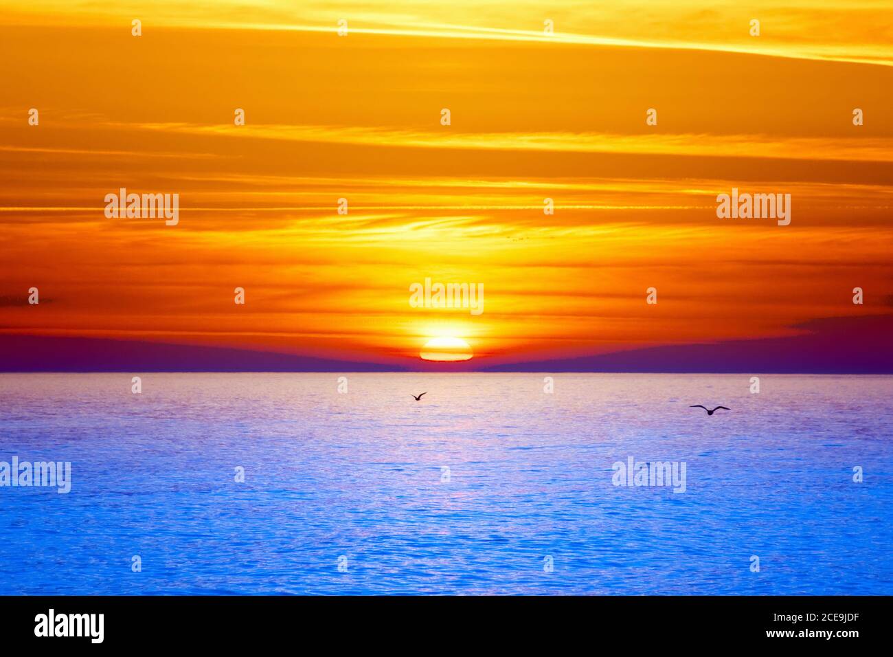 Scene sunset over sea hi-res stock photography and images - Alamy