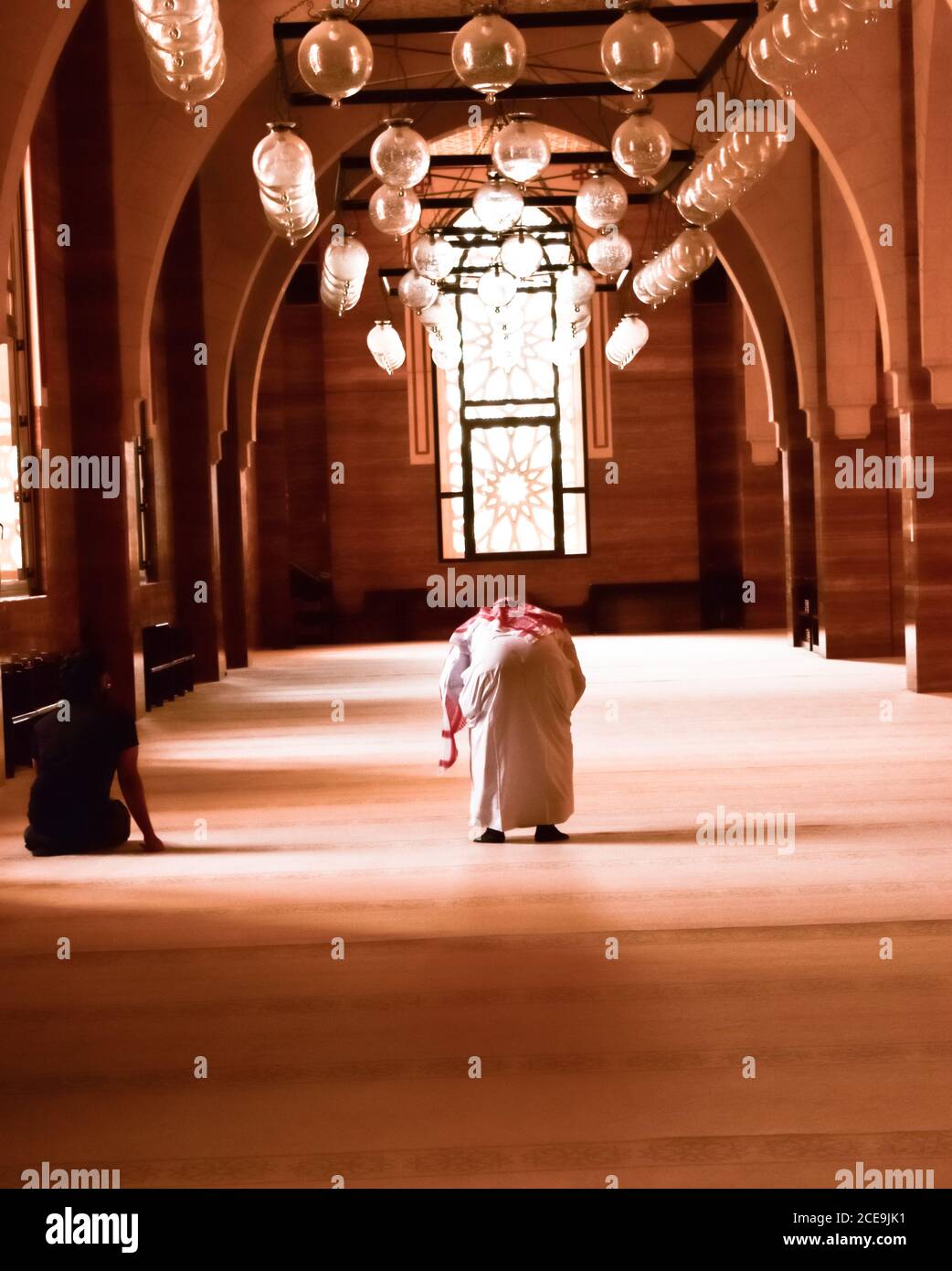 Religious Muslim devotee praying inside the mosque Stock Photo - Alamy