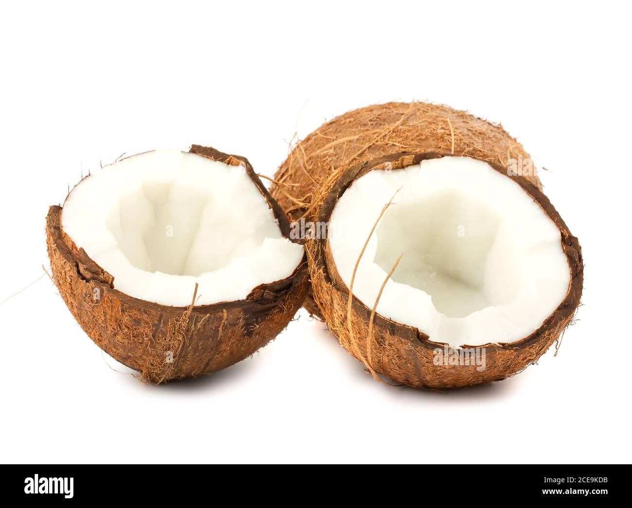 Full and two halves of coconut Stock Photo - Alamy