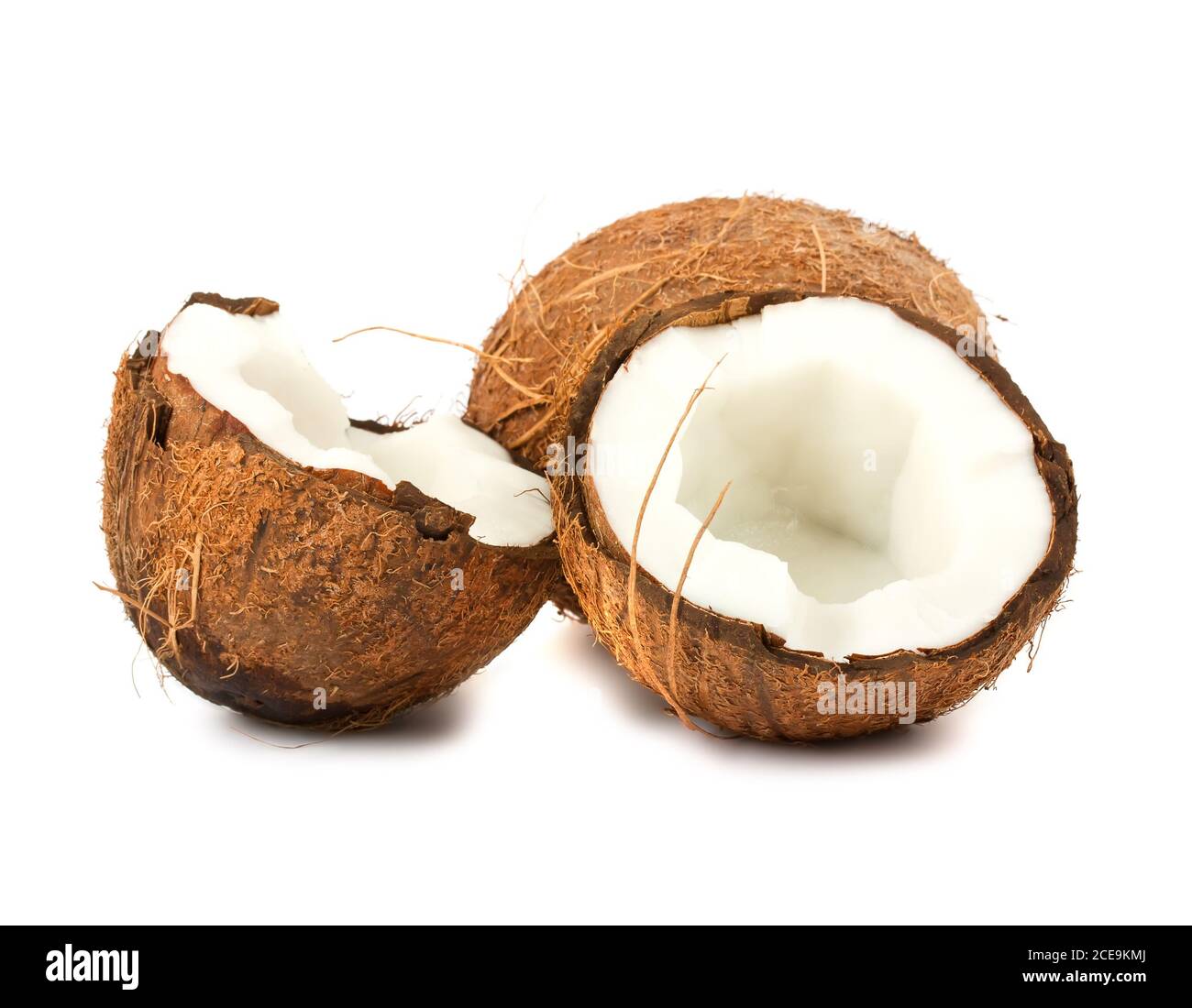 One full and two halves of coconut Stock Photo - Alamy