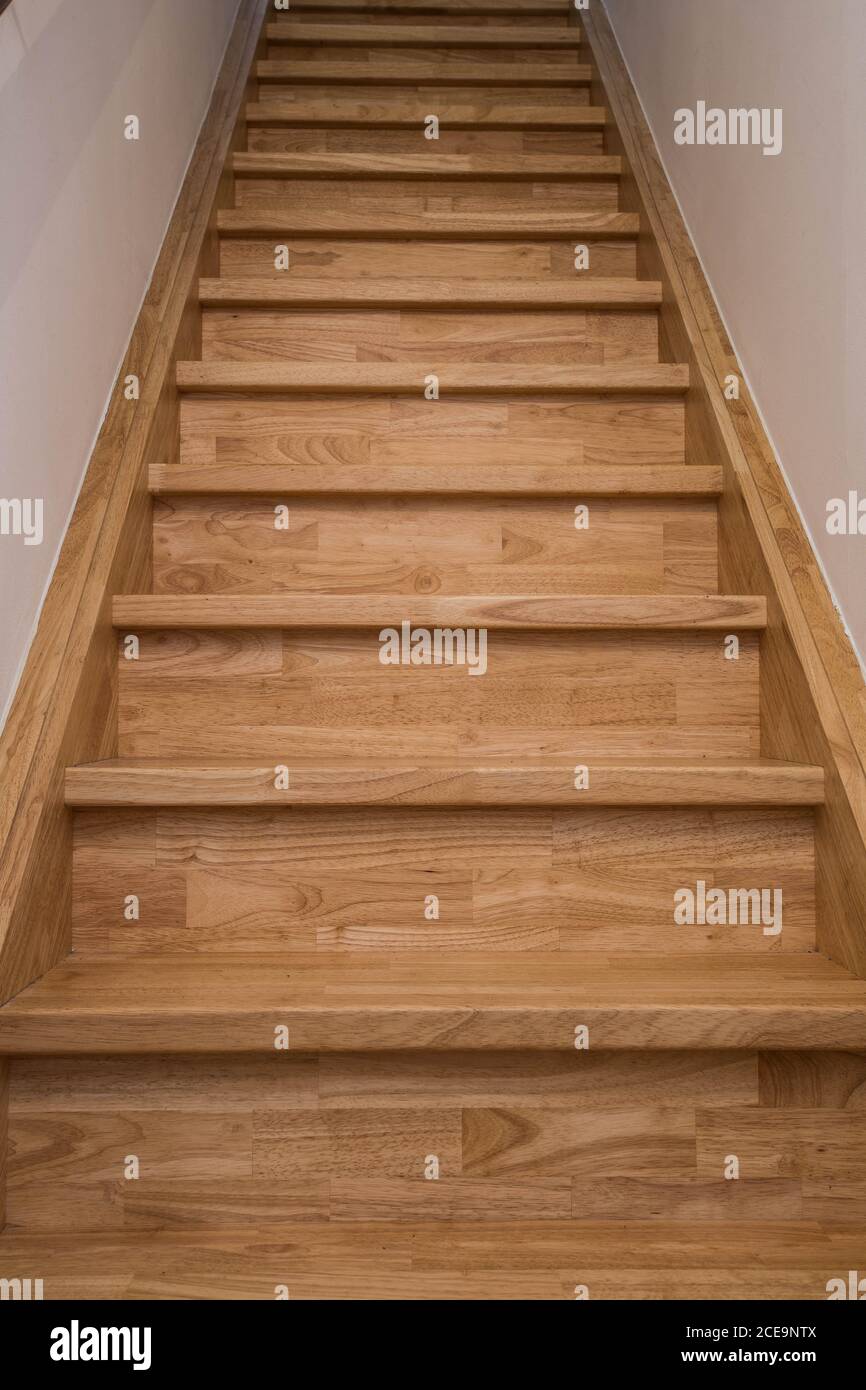 long wooden stairs, modern house interior close-up Stock Photo - Alamy
