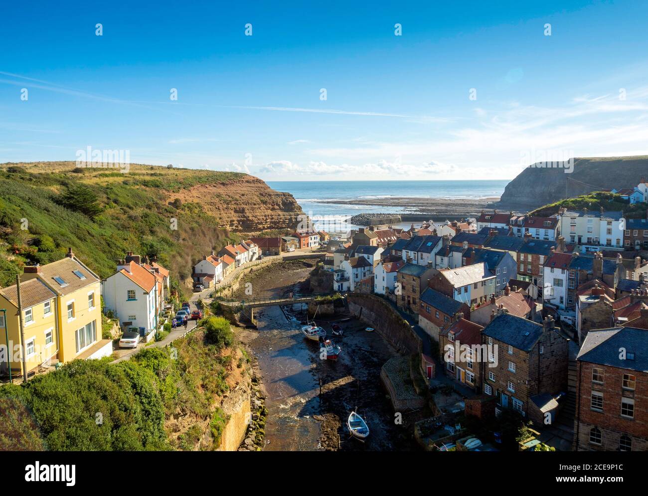 View looking seawards over the harbour of the North Yorkshire Village ...