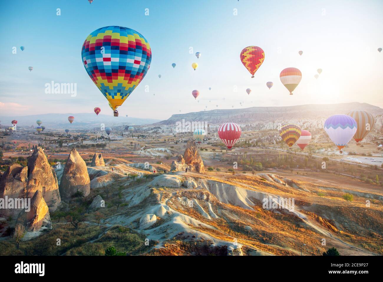 Hot air balloon flying over Cappadocia, Turkey Stock Photo - Alamy