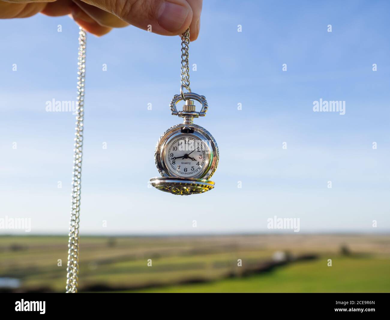 One person with one antique chain watch plated in his hand Stock Photo ...