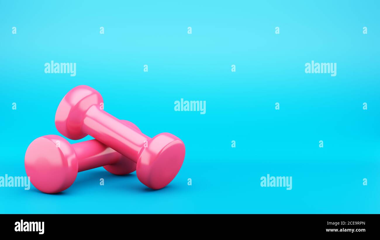 pink dumbbells isolated on blue background Stock Photo - Alamy