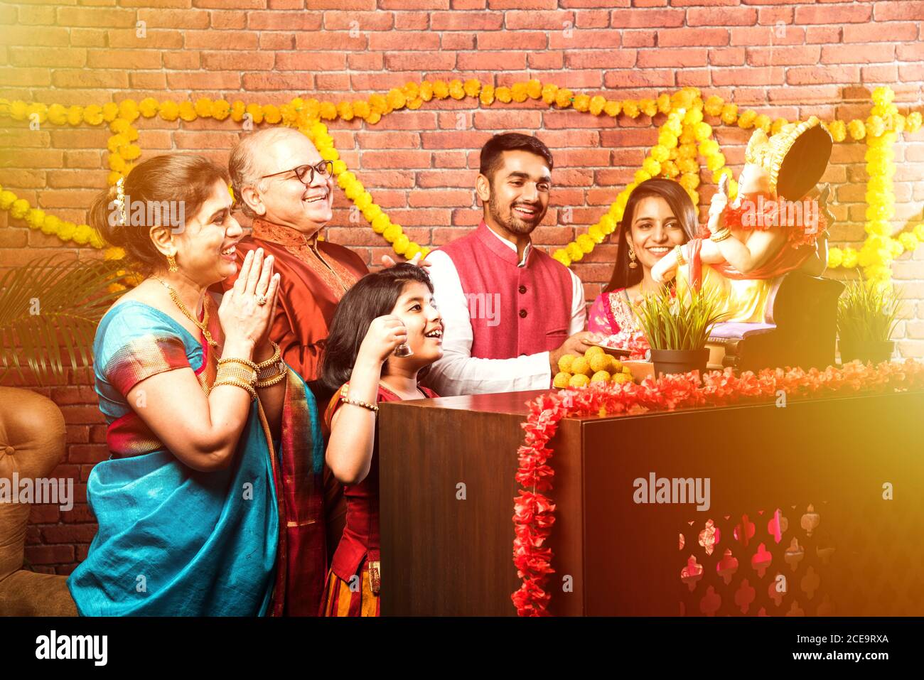 Indian woman performing pooja hi-res stock photography and images - Alamy