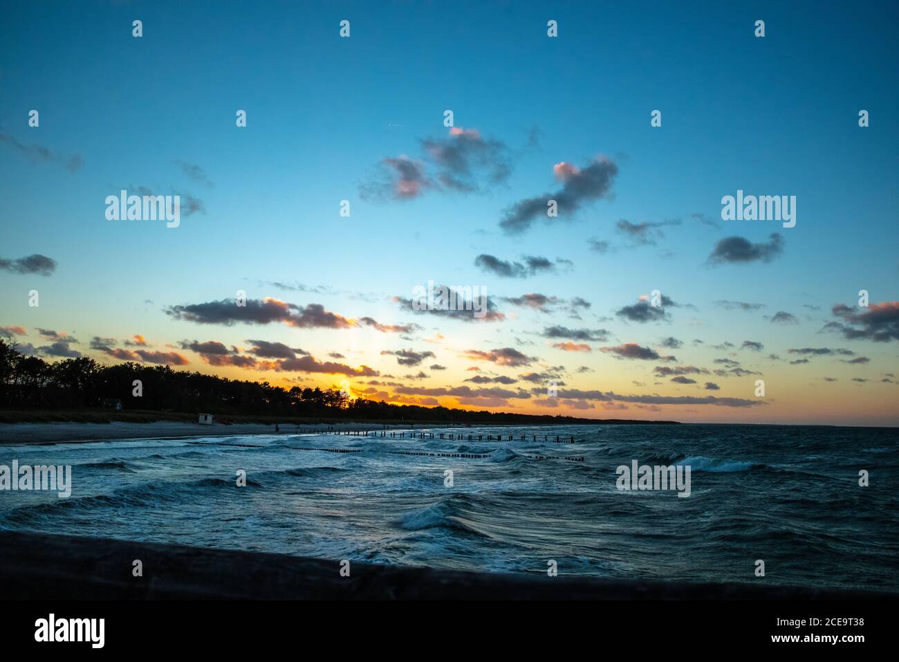 Sunset at the seaside Stock Photo - Alamy