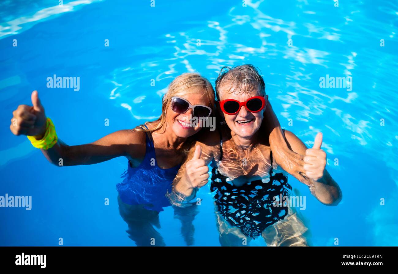 Women in swimming pool hi-res stock photography and images - Alamy