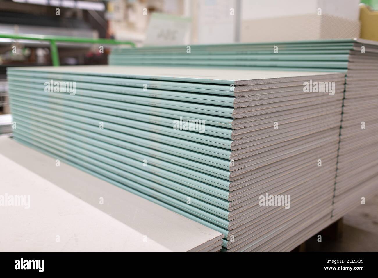 Pallet with Drywall sheets plasterboard in the building warehouse store ...