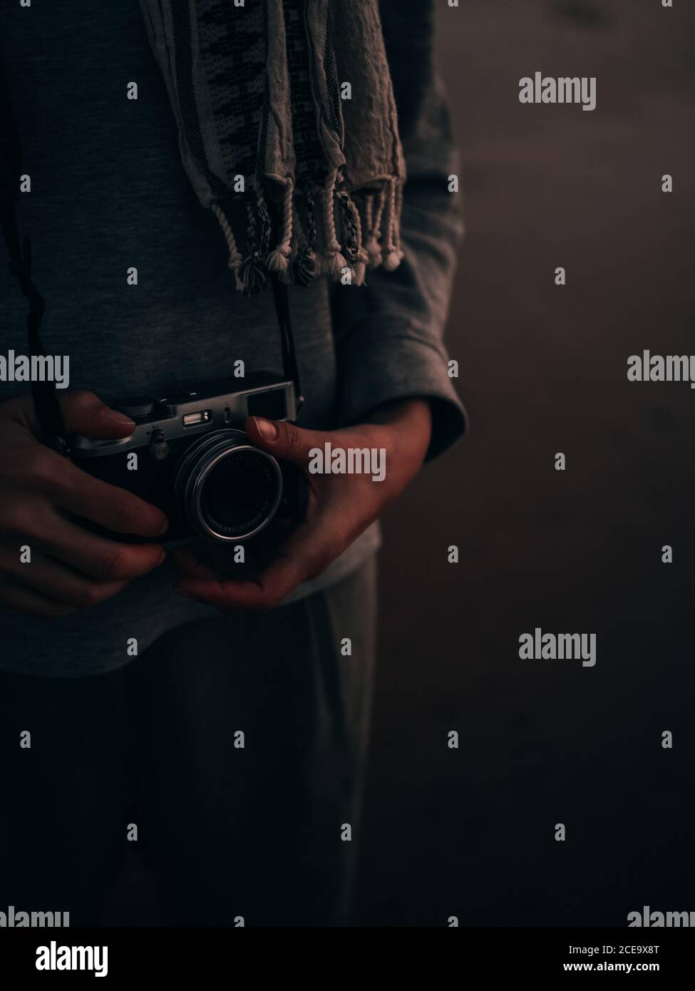 Crop person with photo camera Stock Photo - Alamy