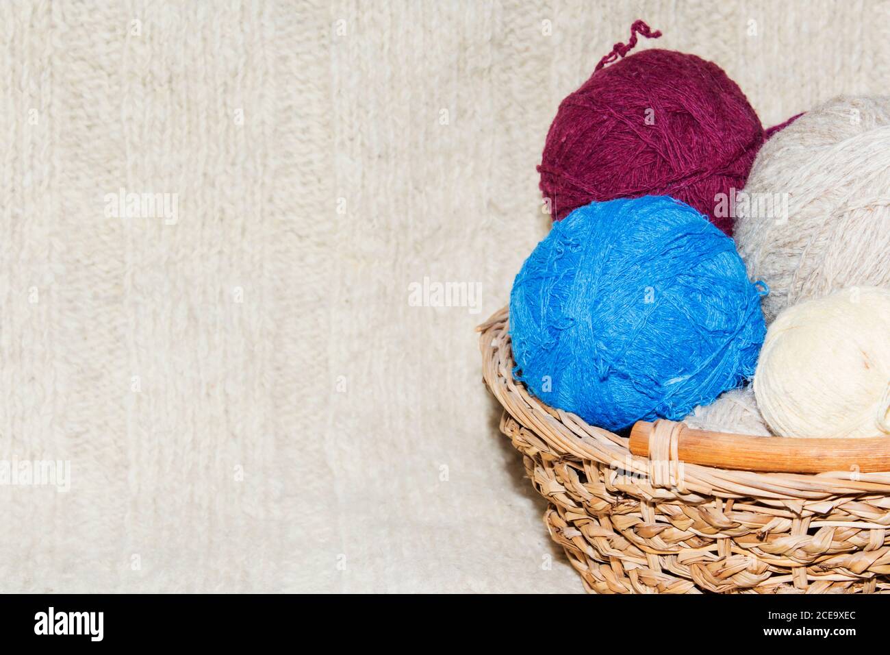 Woolen yarn in basket hi-res stock photography and images - Alamy