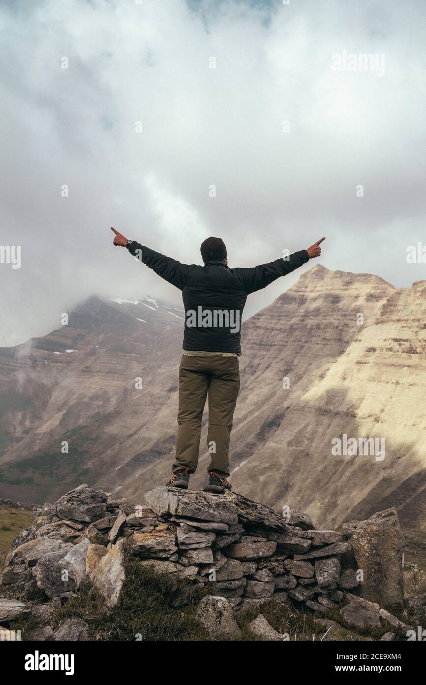 Back view male standing castro valnera mountain between mist burgos hi ...